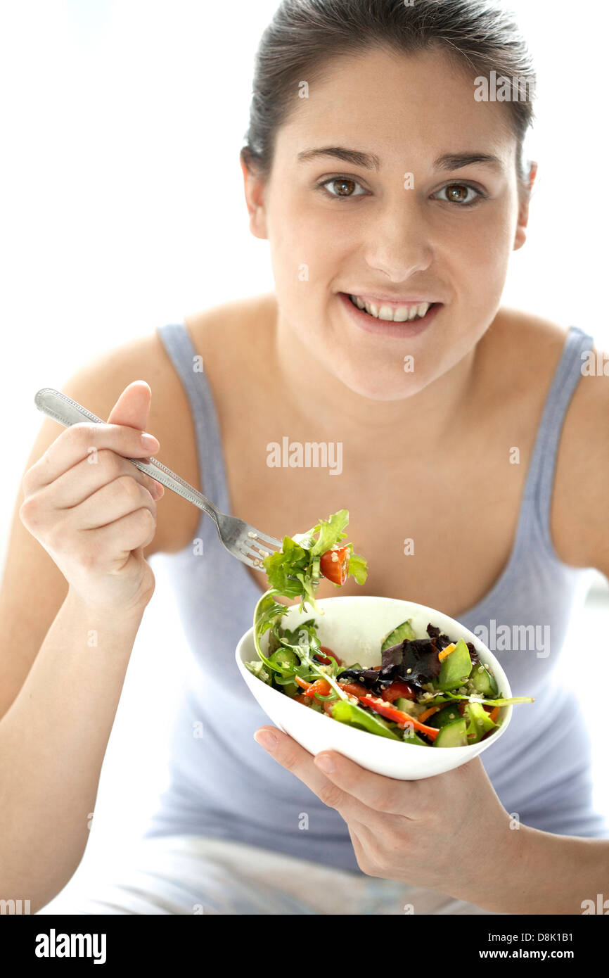 Woman eating salad happy hi-res stock photography and images - Alamy