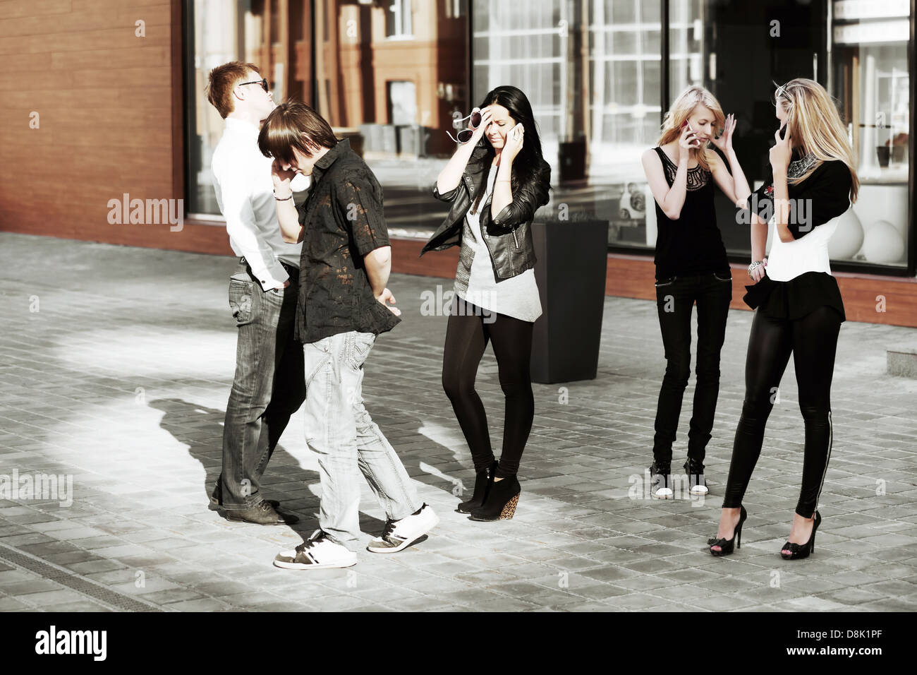 Young people calling on the mobile phones Stock Photo - Alamy