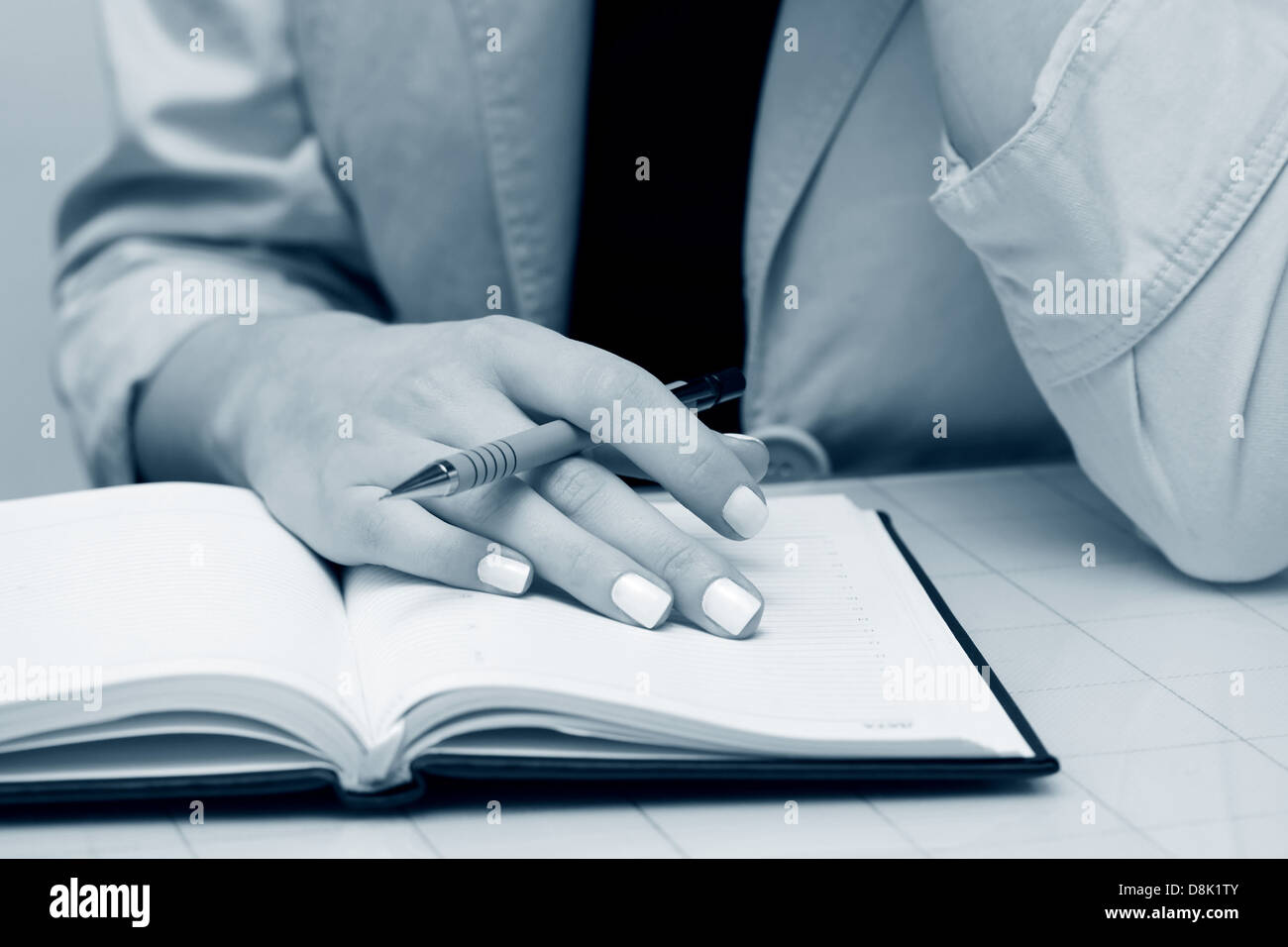 Female hand writing Stock Photo - Alamy