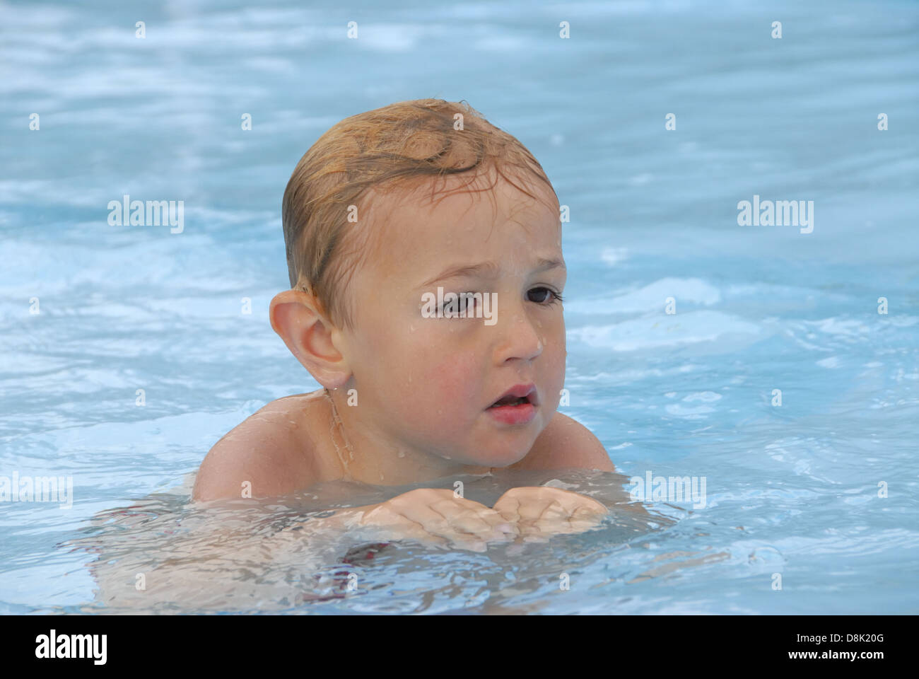 The first swimming attempts Stock Photo - Alamy