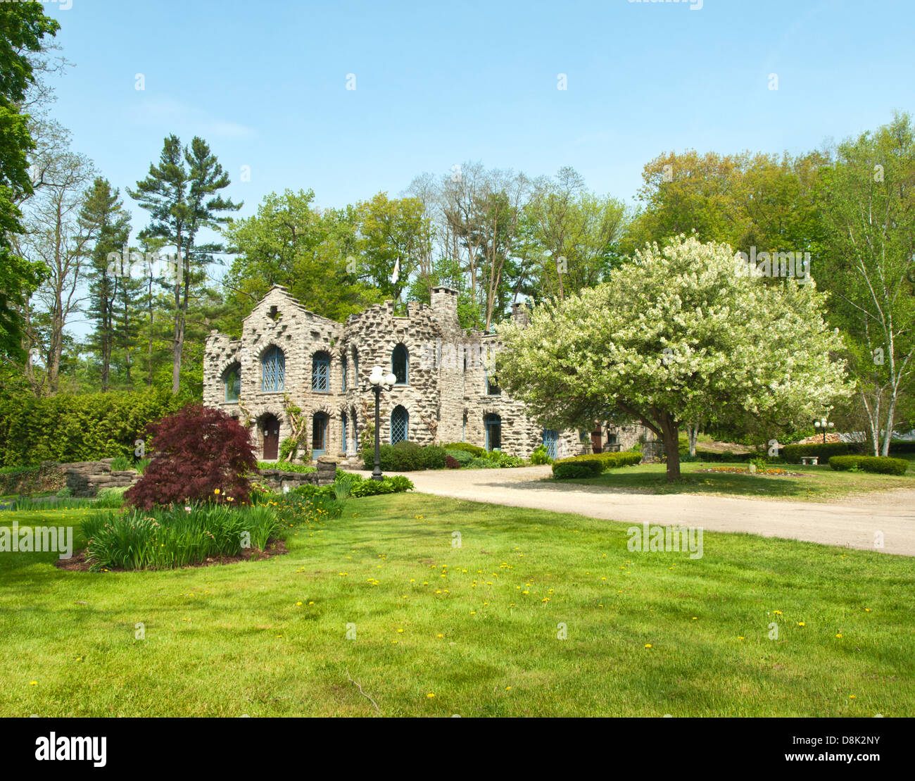 estate with a small castle in springtime Stock Photo - Alamy