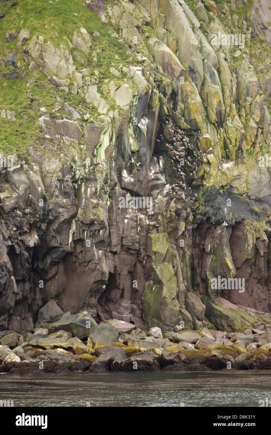 Towering cliffs rise dramatically hi-res stock photography and images ...