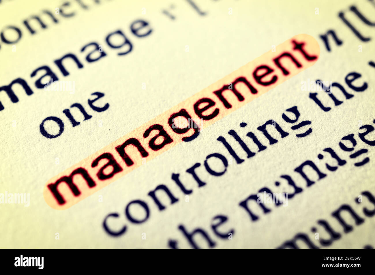 The word Management highlighted in red. Selective focus in the middle ...