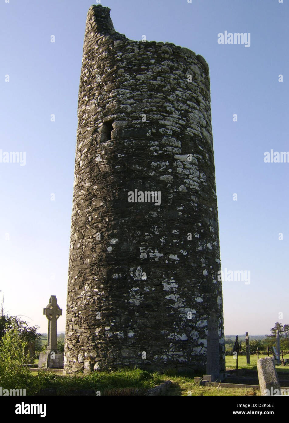 The side view of the entrance part of an Irish round tower in Kilcullen ...