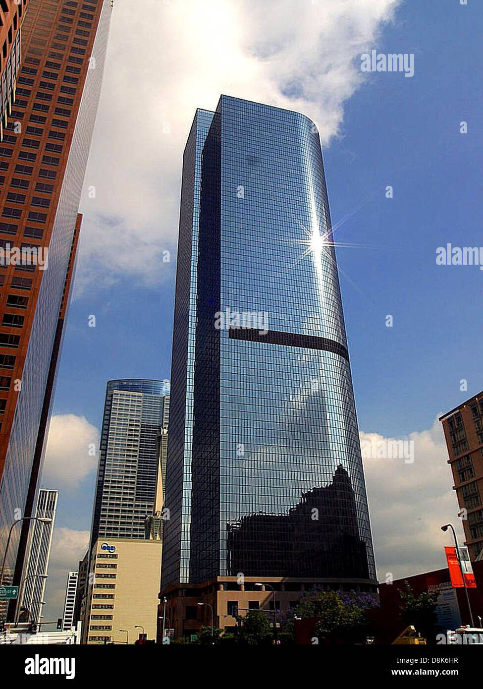 A view of tall skyscrapers in a downtown urban area. These modern ...