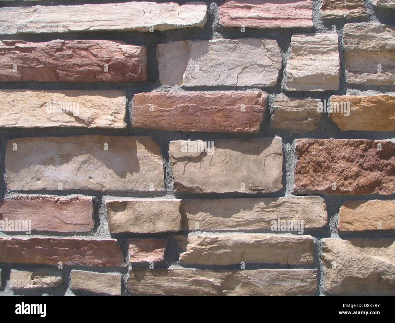 The image showcases a great stone wall, highlighting its solid ...