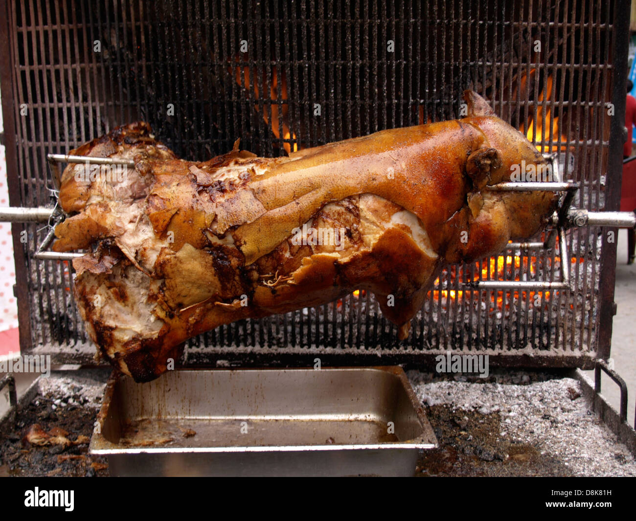 a pig being roasted Stock Photo - Alamy