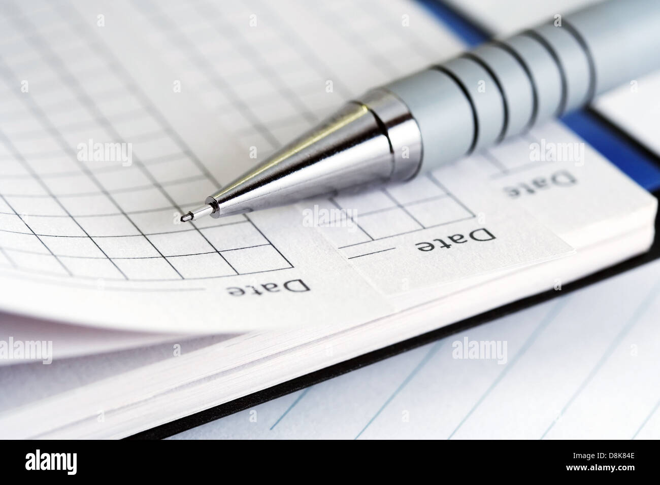 Pen and notebook Stock Photo - Alamy