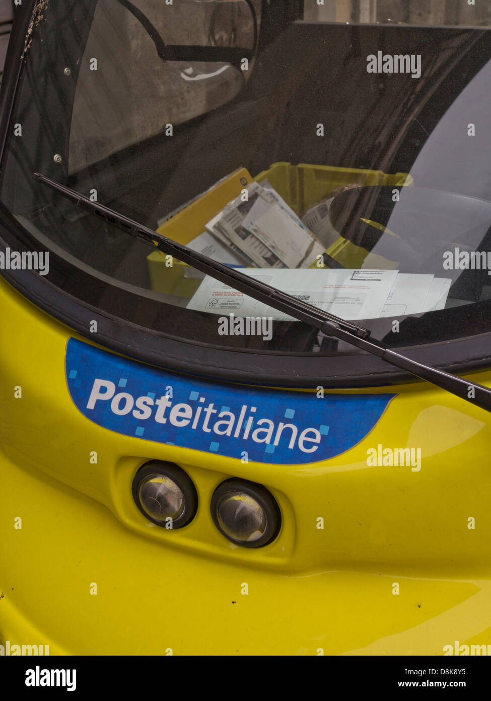 Post office electric car in Pisa, Italy Stock Photo - Alamy