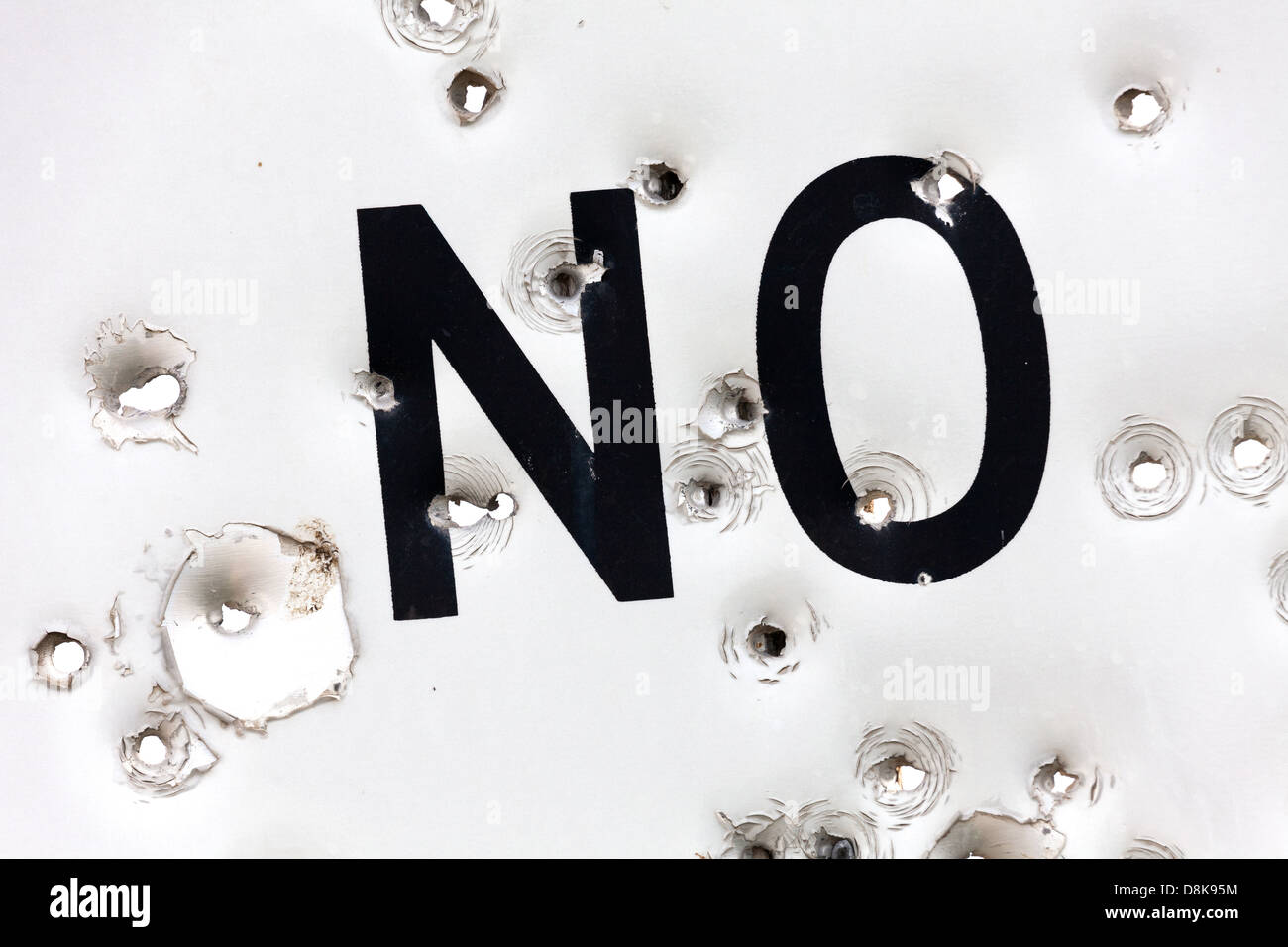 Warning Sign with Bullet Hole Stock Photo - Alamy