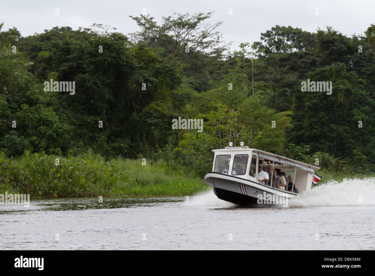 By Lancha and Boat along the Tortuguero Canal, Tortuguero National Park ...