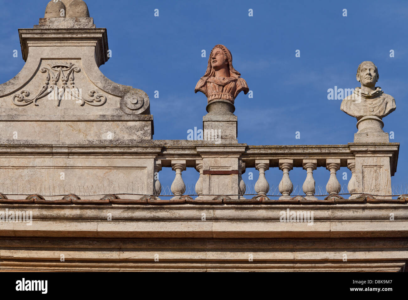 Statues on top of churches in the medieval town of Volterra,Tuscany ...