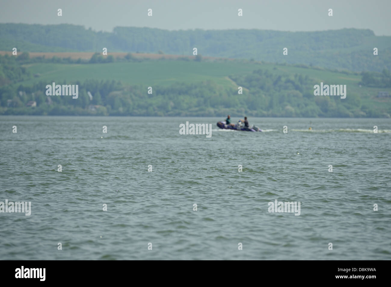 Motorboating on a lake Stock Photo - Alamy