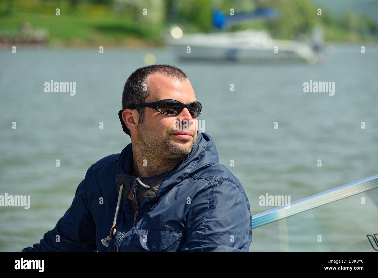 Bearded man in sunglasses sitting hi-res stock photography and images ...
