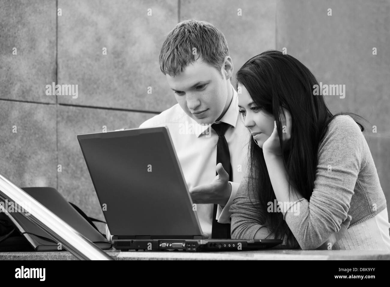 Using laptop outside Black and White Stock Photos & Images - Alamy