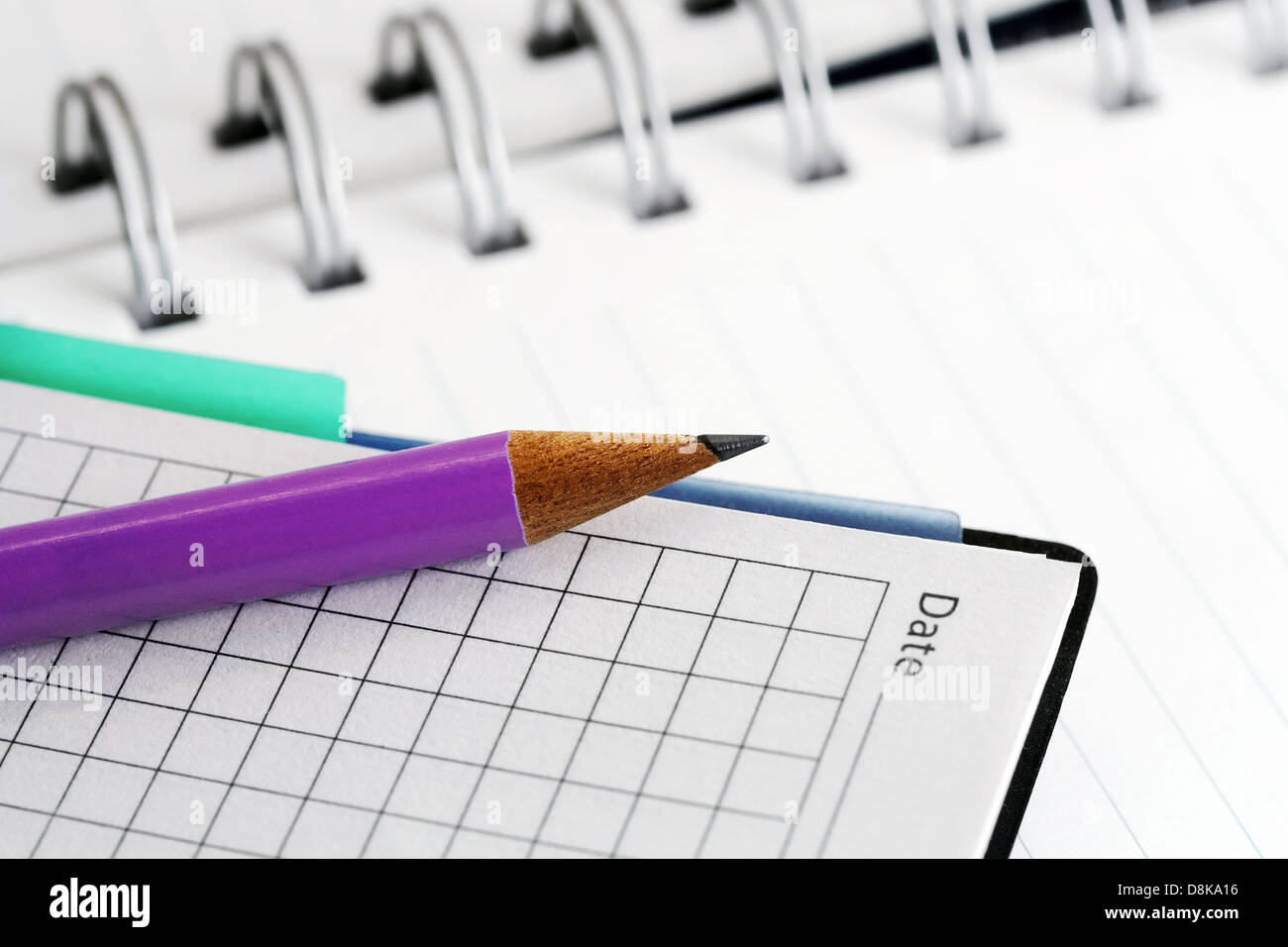 Pencil and notebook Stock Photo - Alamy