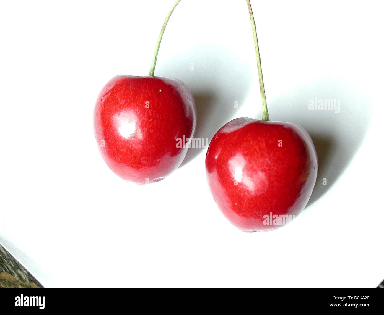 Two red cherry Stock Photo - Alamy