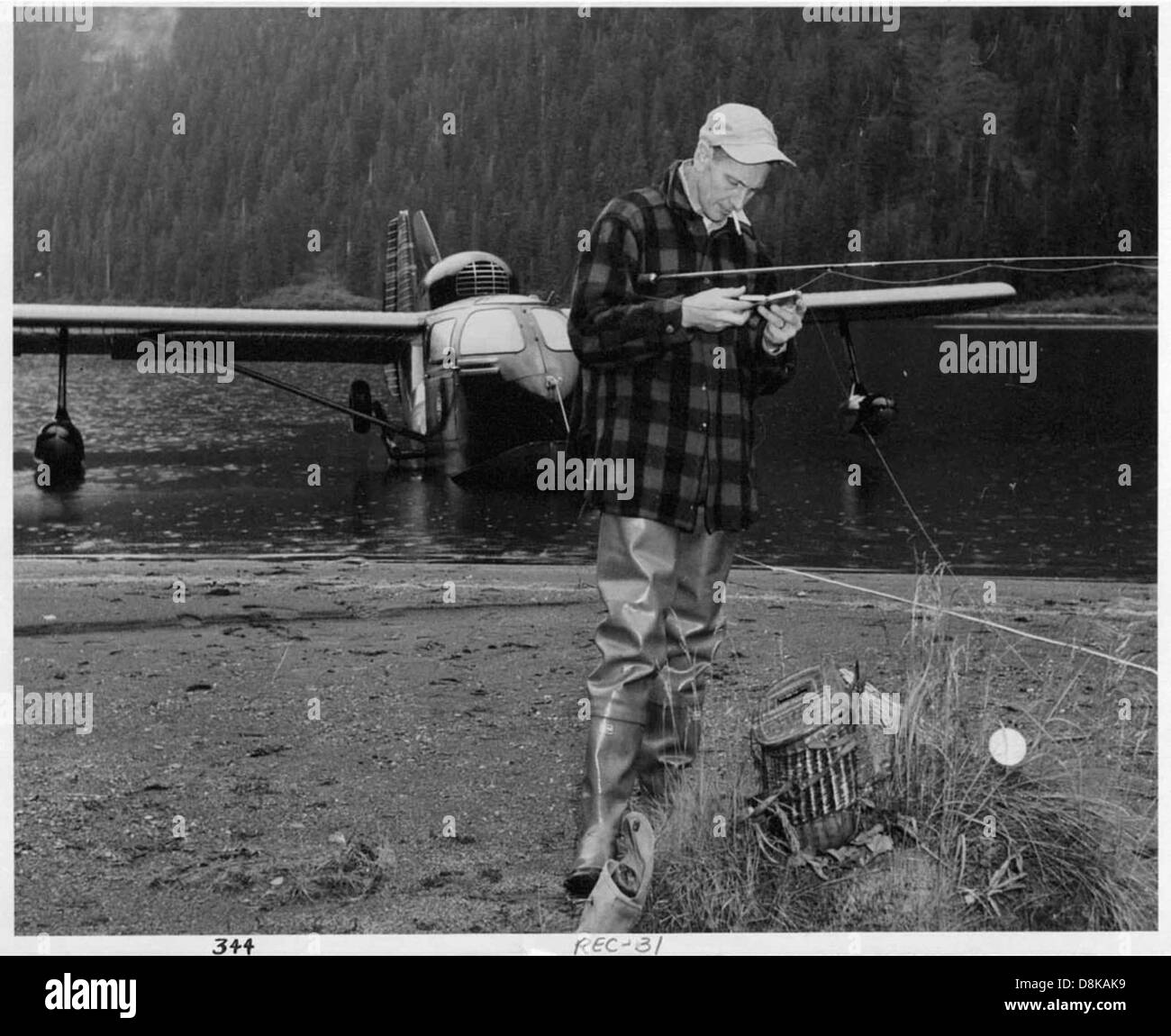 Lake summer man fishing Black and White Stock Photos & Images - Alamy