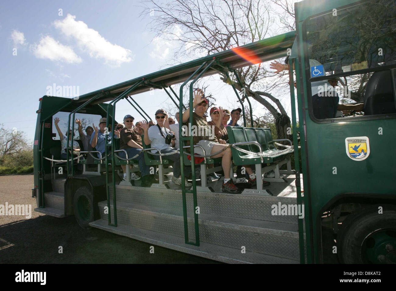 Visitor tour bus visitors wave as they depart on the tour Stock Photo ...
