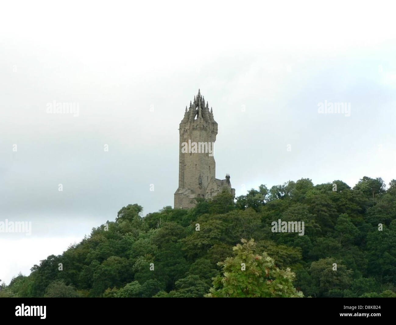This image shows the Wallace Monument, a historical tower in Stirling ...