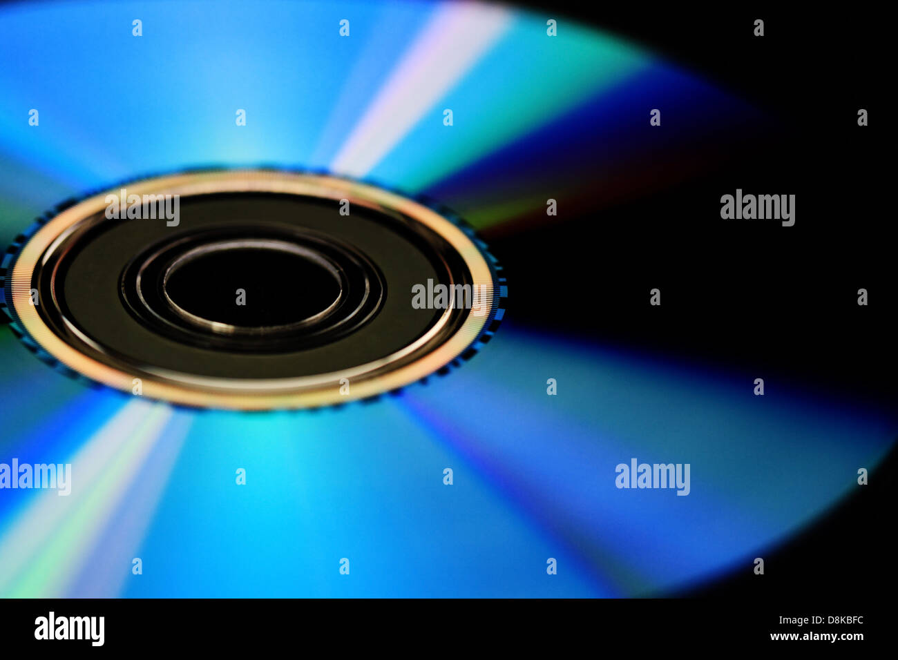Compact disk isolated on black background Stock Photo - Alamy