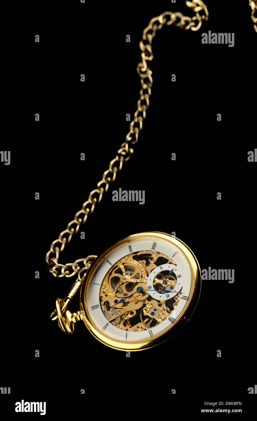 Old watch machine on dark background Stock Photo - Alamy