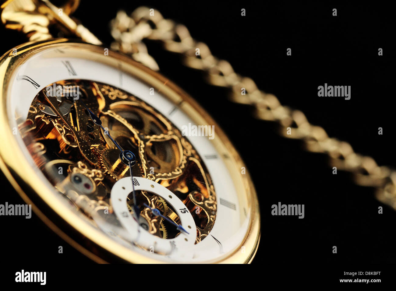 Old watch machine on dark background Stock Photo - Alamy
