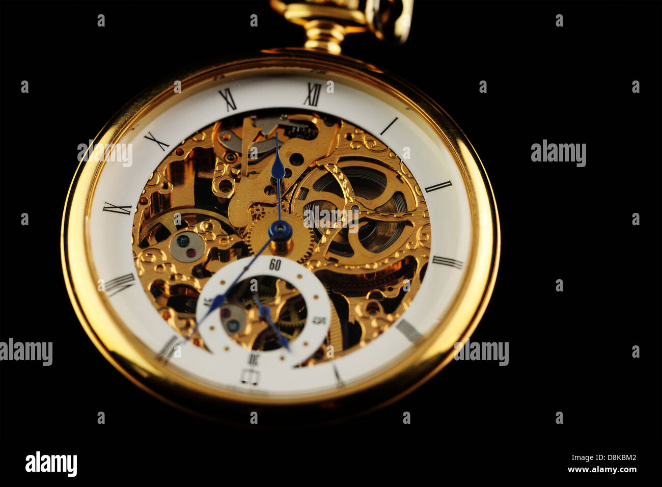 Old watch machine on dark background Stock Photo - Alamy