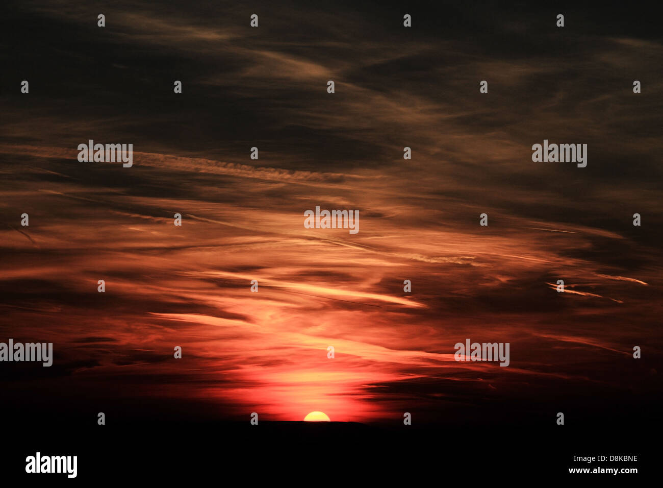 Red sunset sky stormy clouds Stock Photo - Alamy