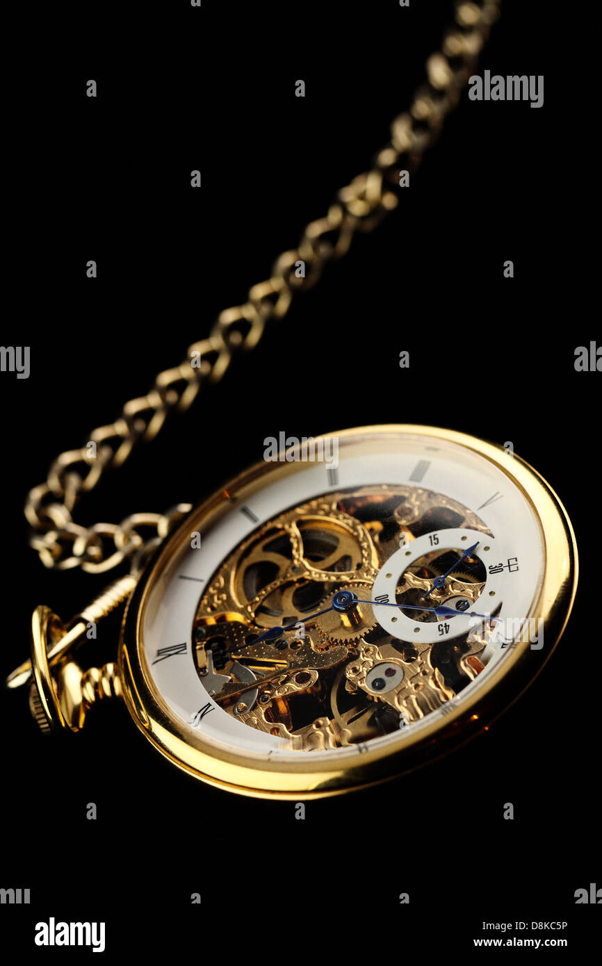 Old watch machine on dark background Stock Photo - Alamy