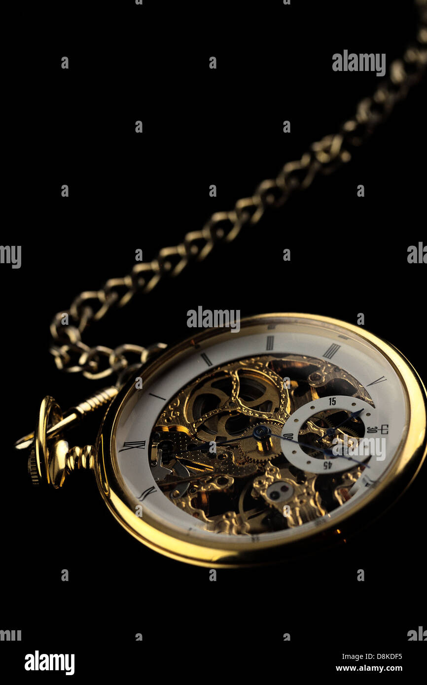 Old watch machine on dark background Stock Photo - Alamy