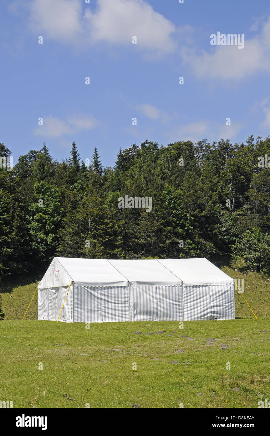 white tent in the woods Stock Photo - Alamy