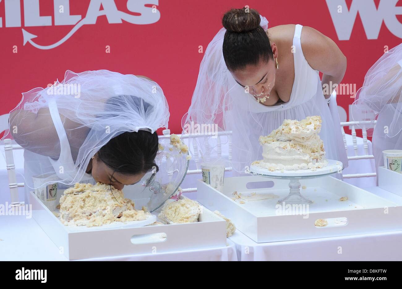 New York, USA. May 30, 2013.Bridezillas at the Bridezillas Cake Eating ...