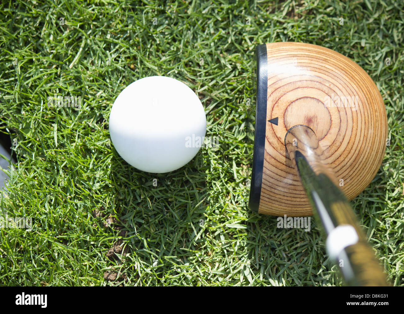 Park golf ball and a club Stock Photo - Alamy