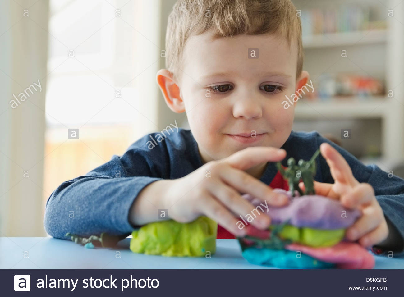 Playing with play dough hi-res stock photography and images - Alamy