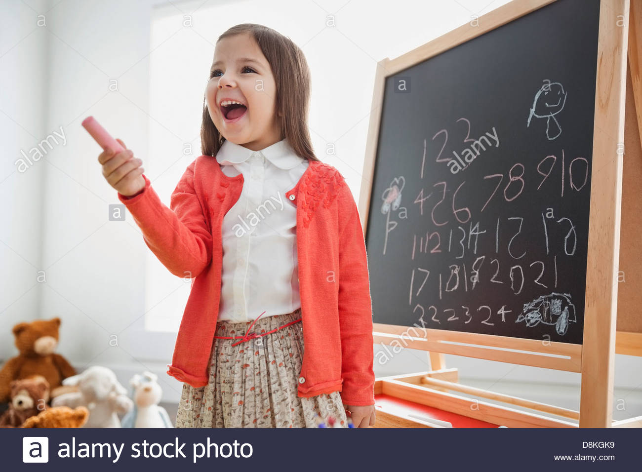 Child pretending to be teacher hi-res stock photography and images - Alamy
