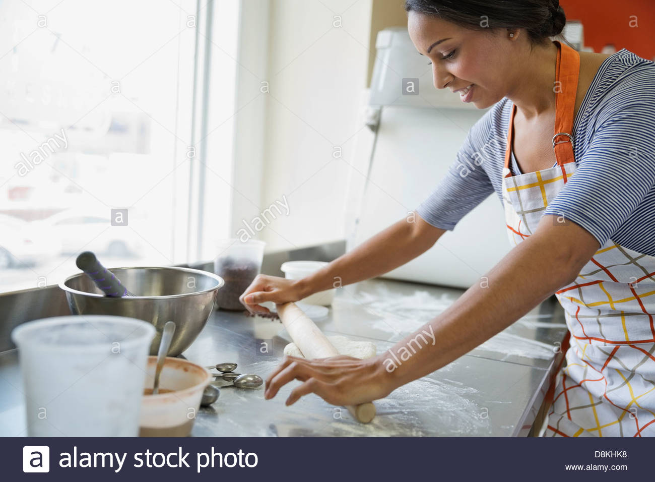 Woman holding rolling pin hi-res stock photography and images - Alamy