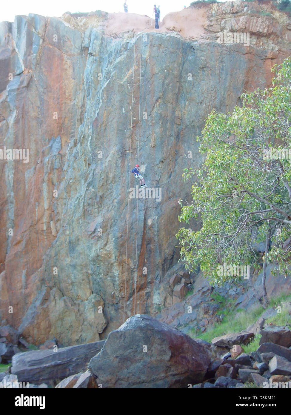 An abseiler descending from a cliff at Gooseberry Hill, showcasing an ...