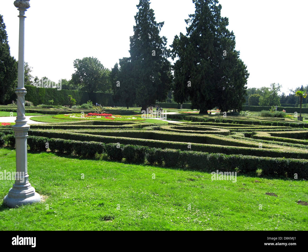 A castle labyrinth garden park with intricate pathways and hedges. The ...