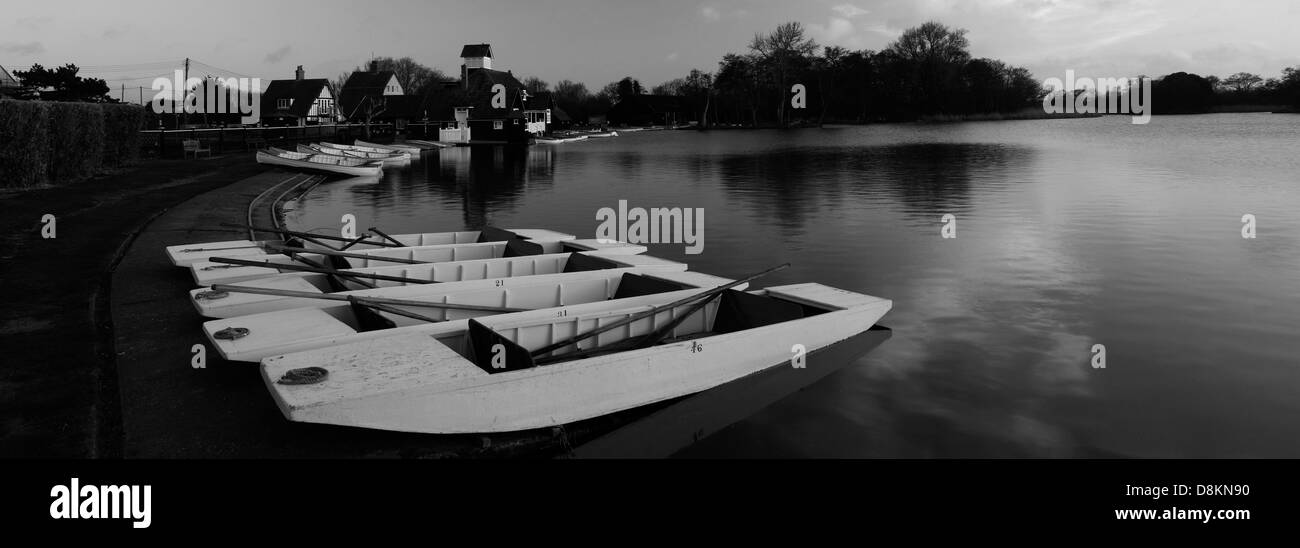 Colourful wooden rowing boats for hire on the Mere lake, Thorpeness ...