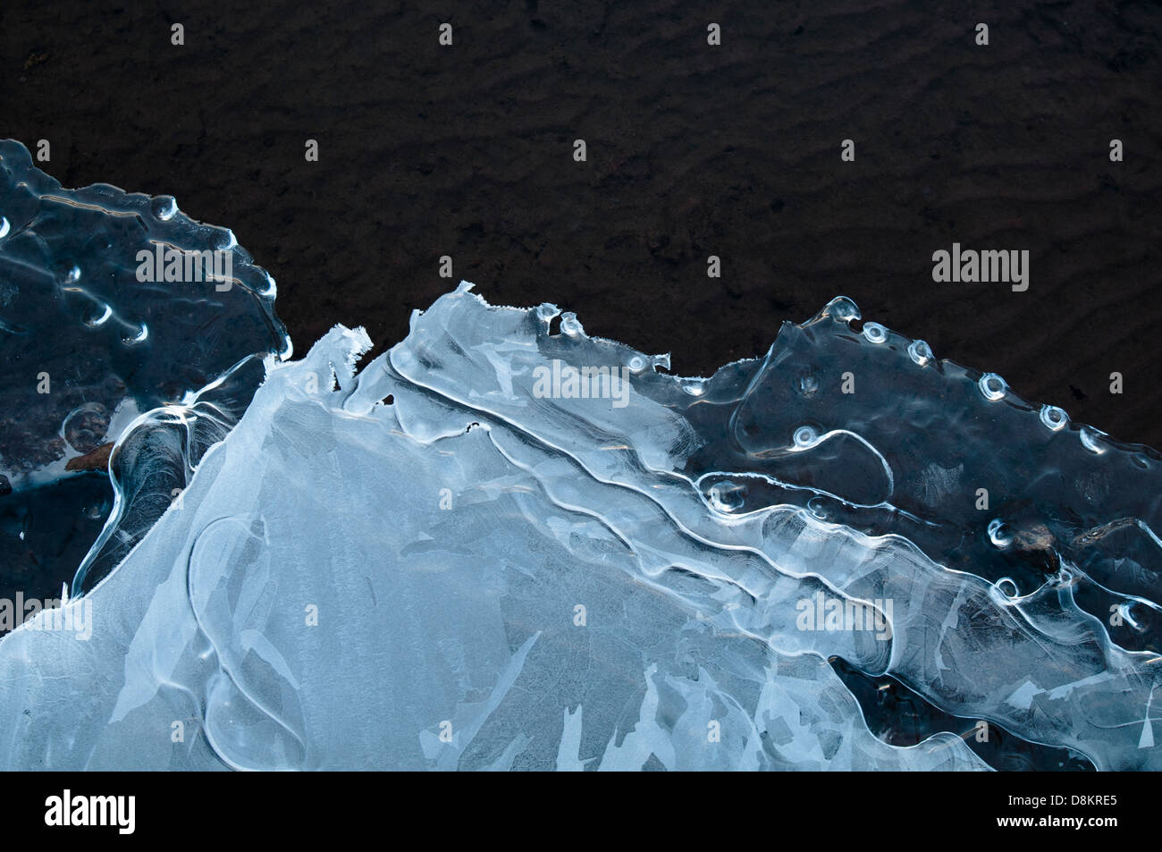 Ice over water Stock Photo - Alamy