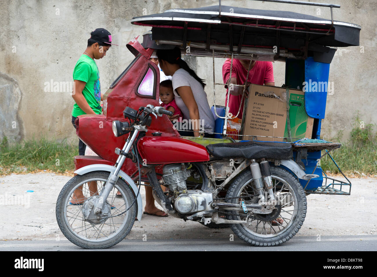 Tricycle in Moalboal on Cebu Island, Philippines Stock Photo - Alamy