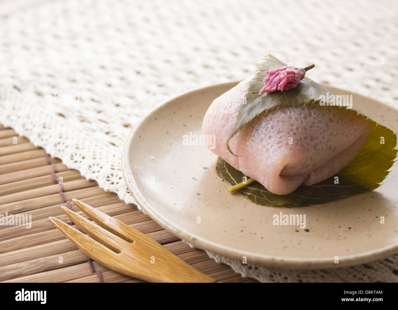 Sakura mochi (cherry flavored soft sweet rice cake Stock Photo - Alamy