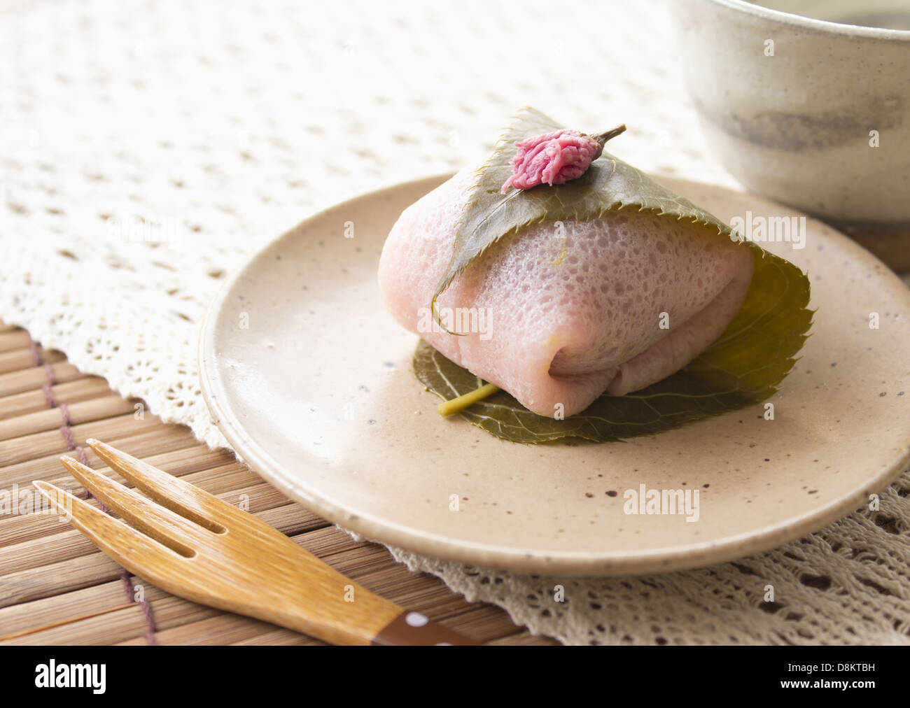 Sakura mochi (cherry flavored soft sweet rice cake Stock Photo - Alamy