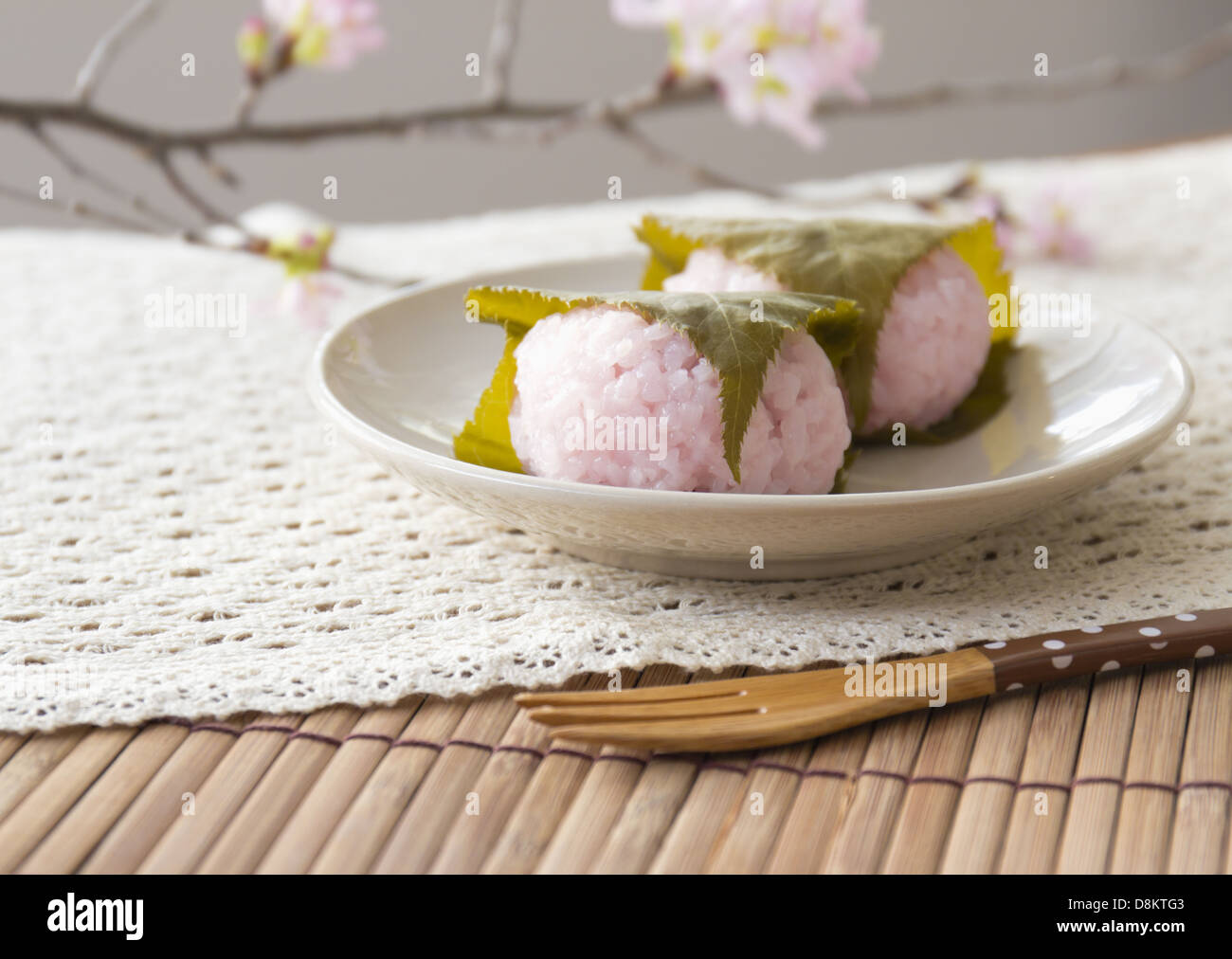 Sakura mochi (cherry flavored soft sweet rice cake Stock Photo - Alamy