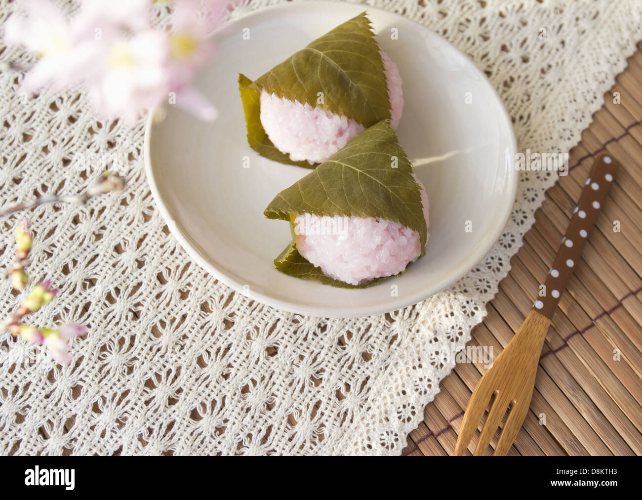Sakura mochi (cherry flavored soft sweet rice cake Stock Photo - Alamy