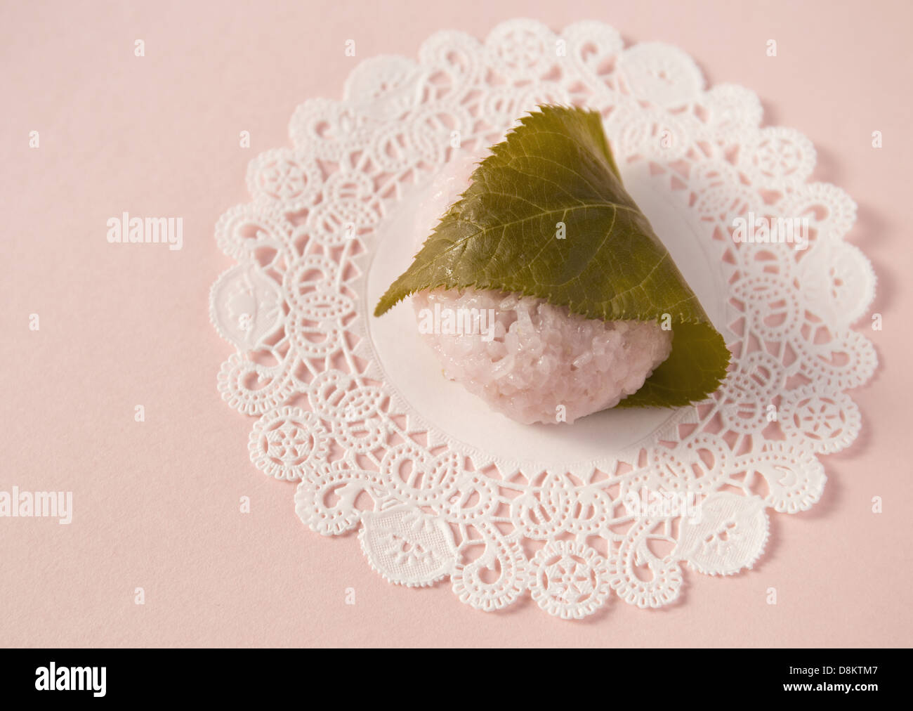 Sakura mochi (cherry flavored soft sweet rice cake Stock Photo - Alamy