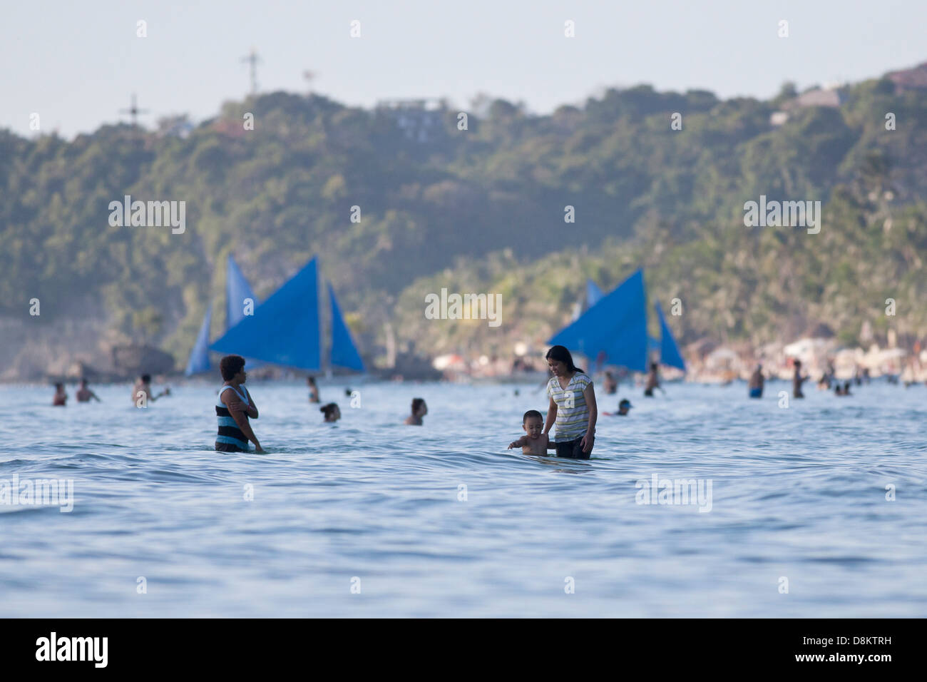 People wading in the ocean hi-res stock photography and images - Alamy