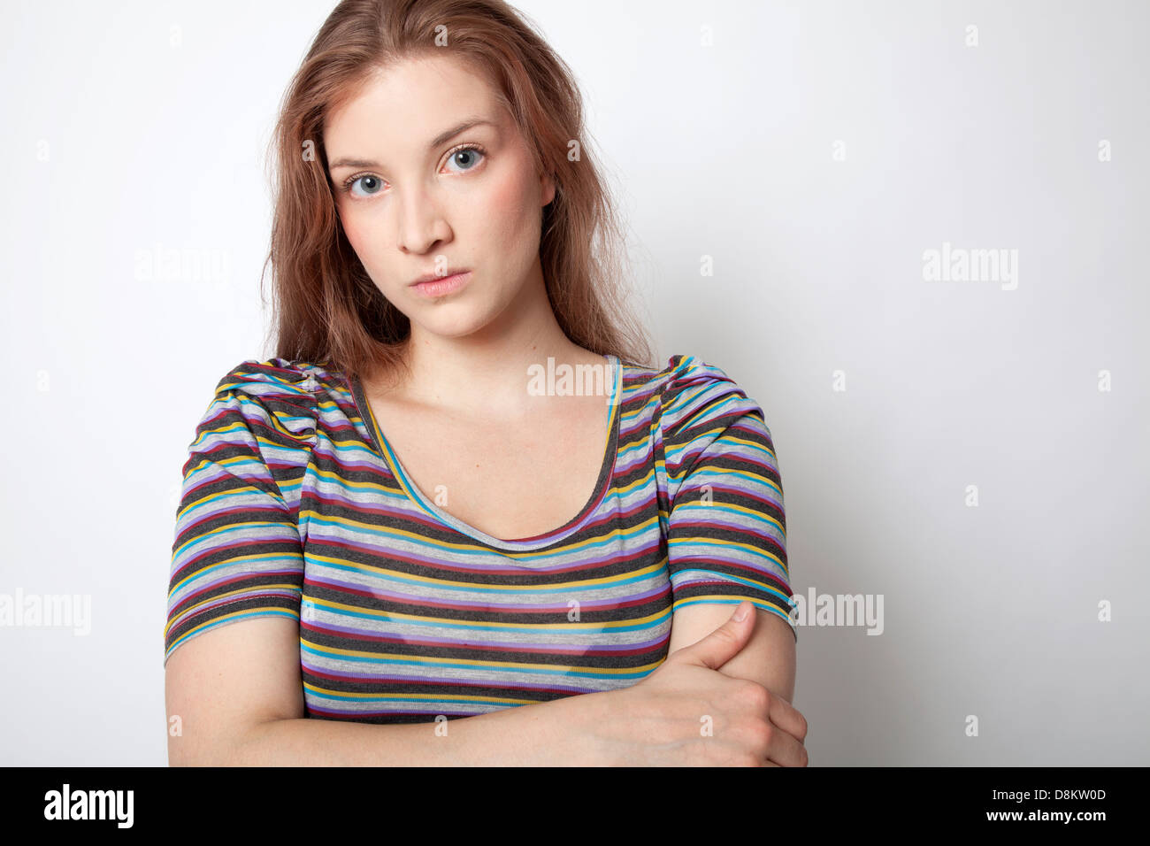 Woman Striped Top Concern Stock Photo - Alamy