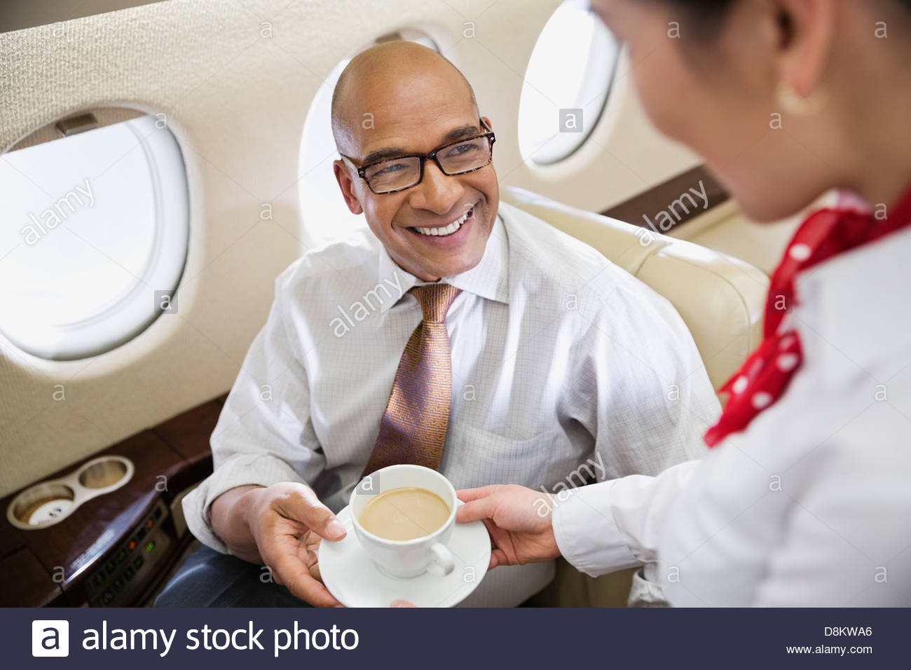 Flight attendant private jet hi-res stock photography and images - Alamy